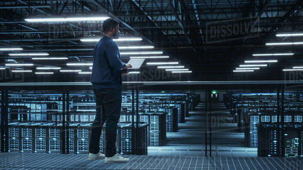 Data Center Engineer Using Laptop Computer - Royalty-free Stock Photo ...