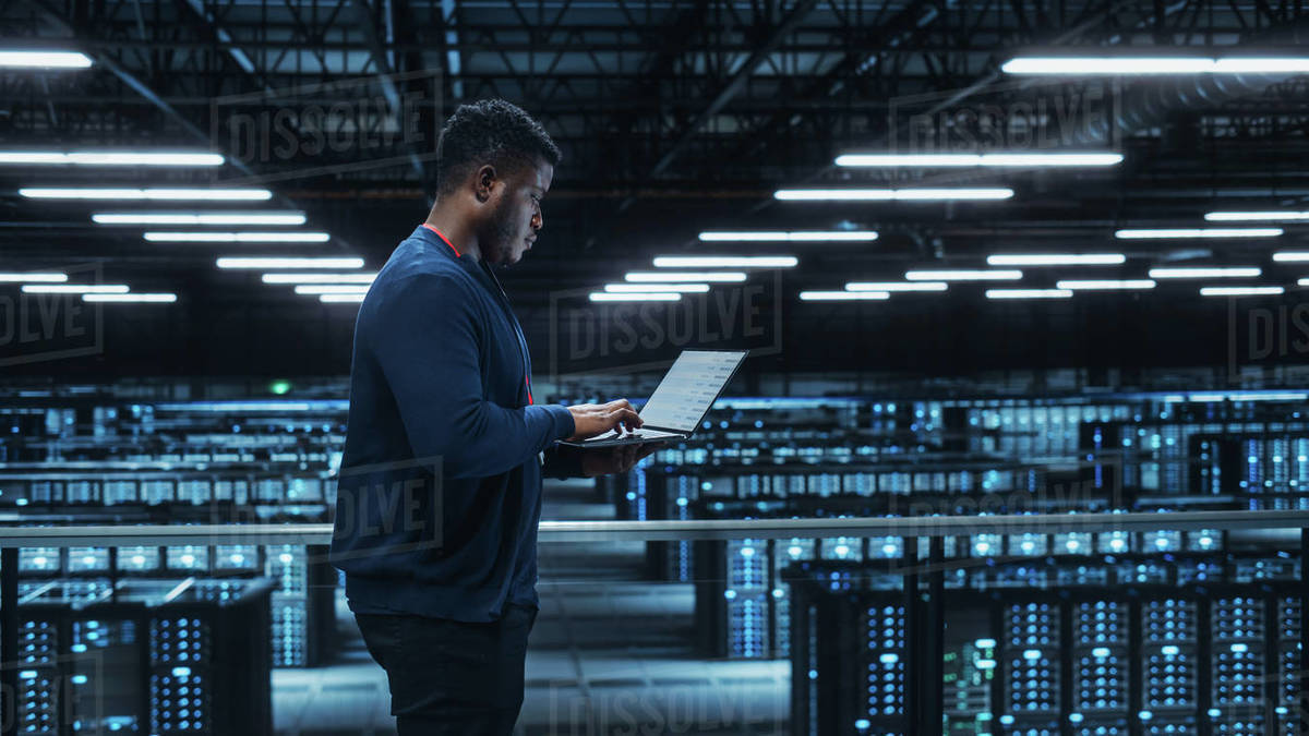 Data Center Engineer Using Laptop Computer - Royalty-free Stock Photo ...
