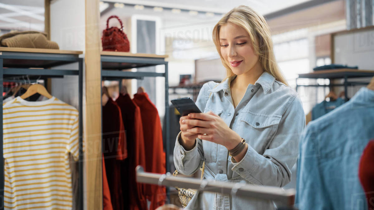 Female Customer Shopping in Clothing Store - Royalty-free Stock Photo ...