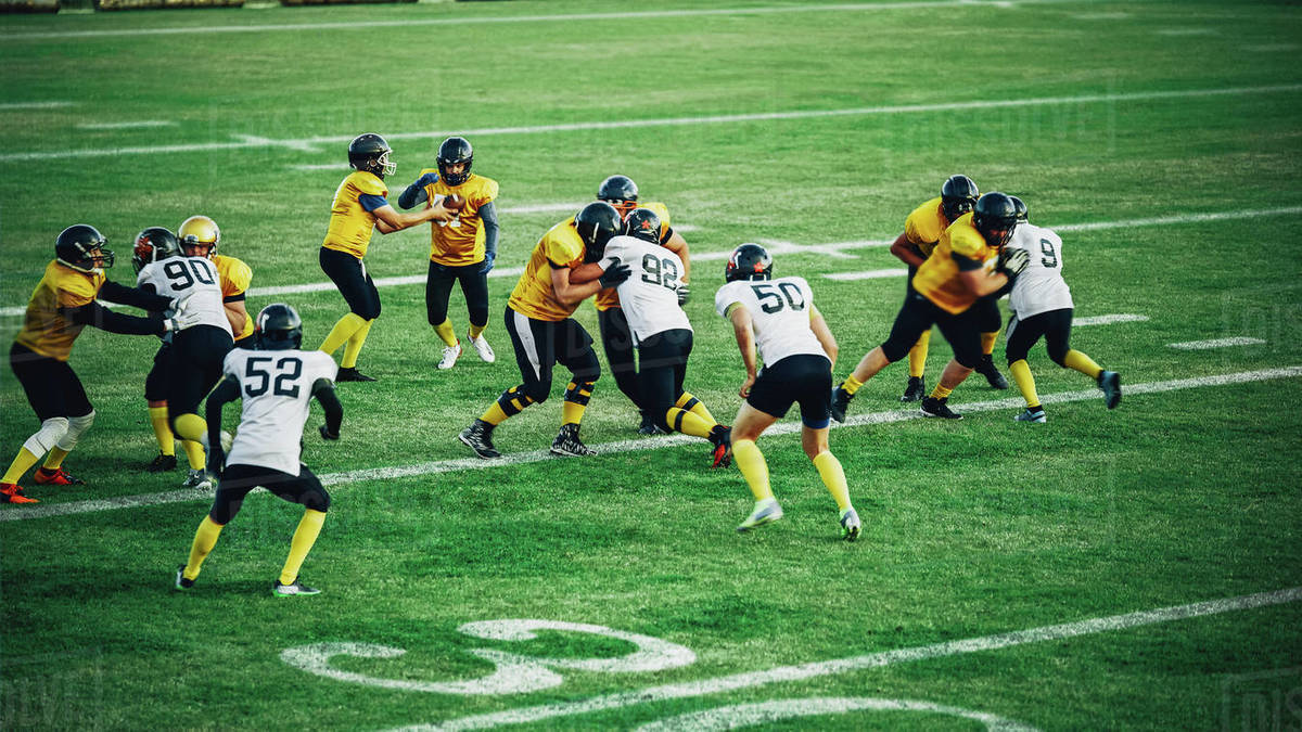 American Football Teams Start Game - Royalty-free Stock Photo | Dissolve
