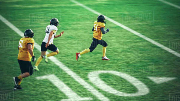 American Football Teams Start Game - Royalty-free Stock Photo | Dissolve
