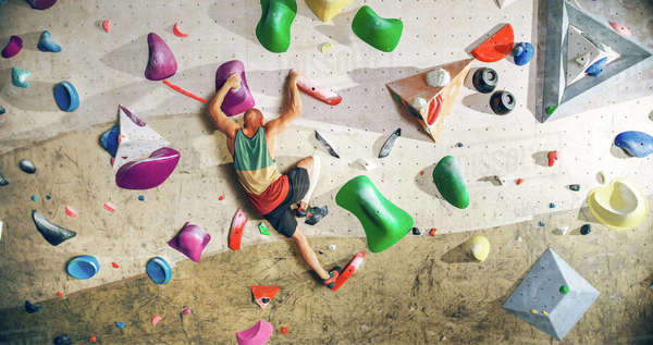 Strong Experienced Rock Climber Practicing Solo Climbing on Bouldering ...