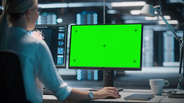 Female IT Specialist Working on Green Screen Chroma Key Computer - 4K ...