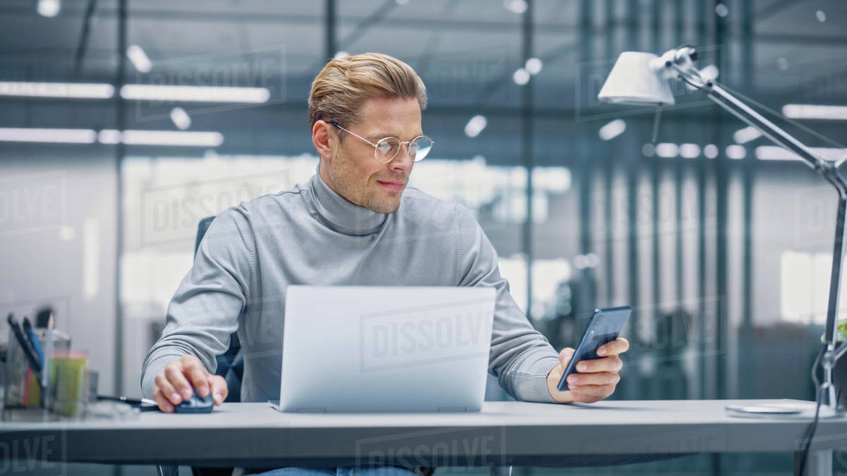 Portrait of Businessman Wearing Glasses Working on Laptop Computer ...