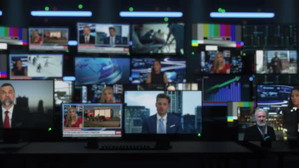 Background with Technological Multi-Screen Wall with TV Sets and ...