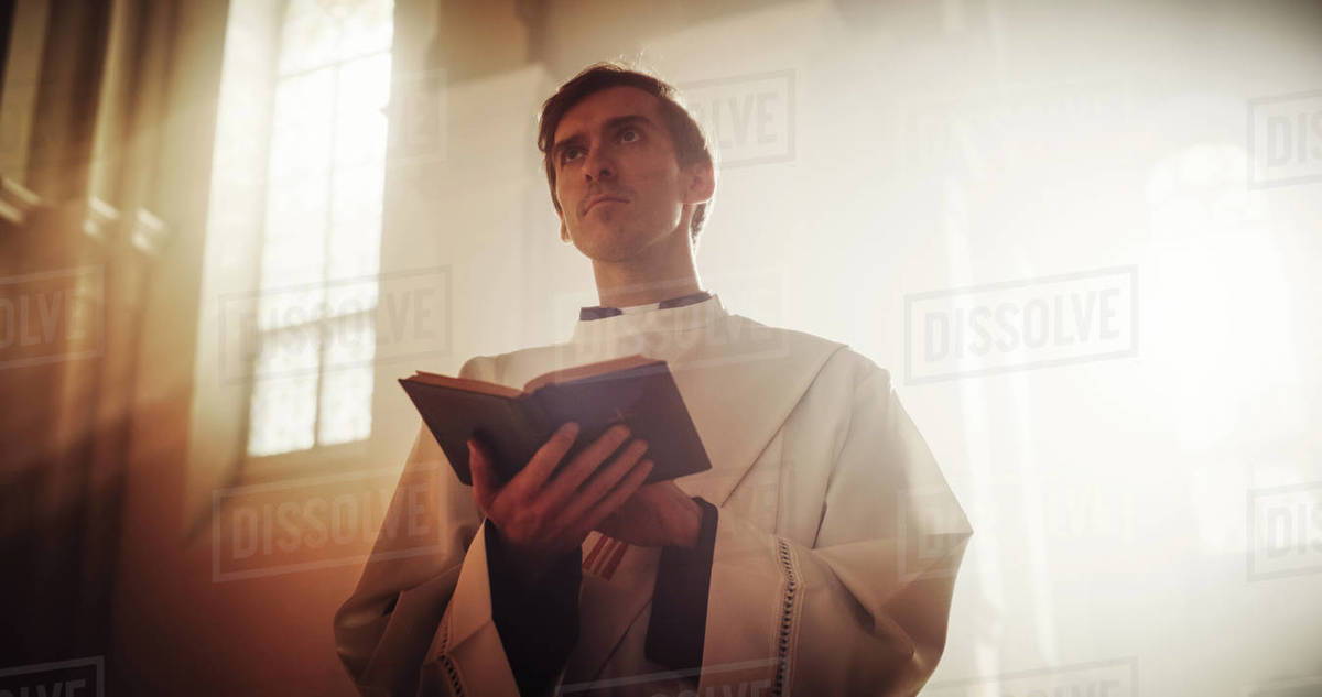 In Christian Church: Portrait of The Minister In Silently Praying ...