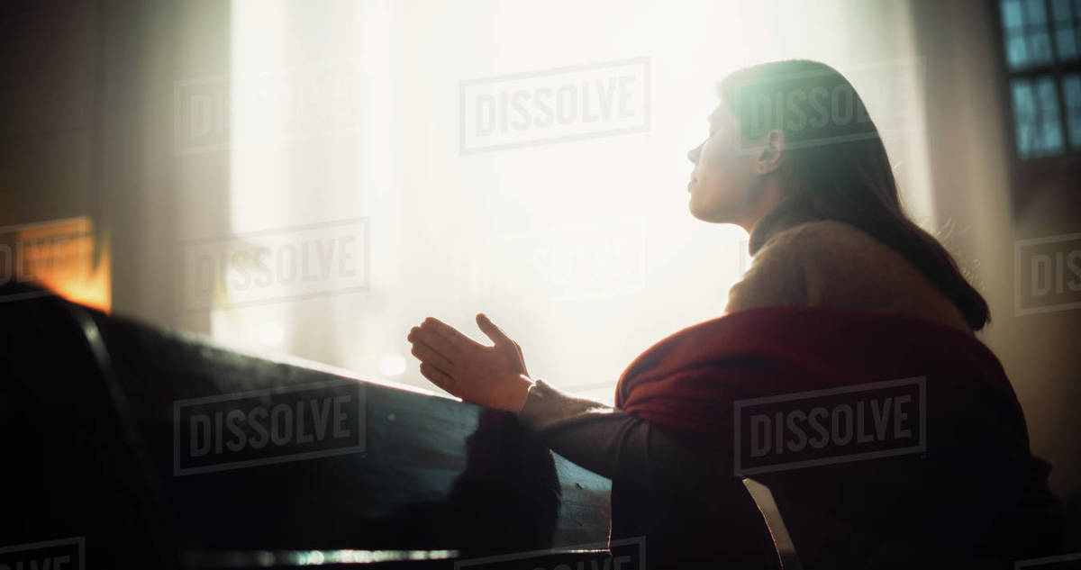 Young Christian Woman Sits Piously in Majestic Church, with Folded ...