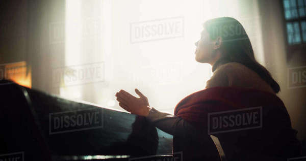 Young Christian Woman Sits Piously in Majestic Church, with Folded ...