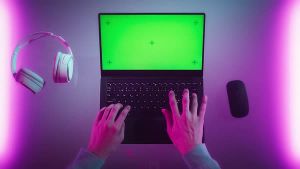 Anonymous Designer Typing on a Laptop with Mock Up Green Screen ...