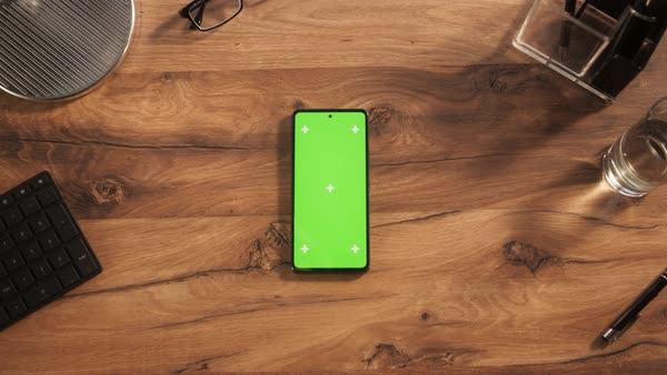 Top Down Static View of a Smartphone with Mock Up Green Screen Display ...