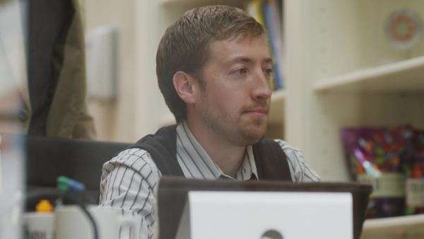 Medium shot of business man patting colleague on shoulder, Provo ...