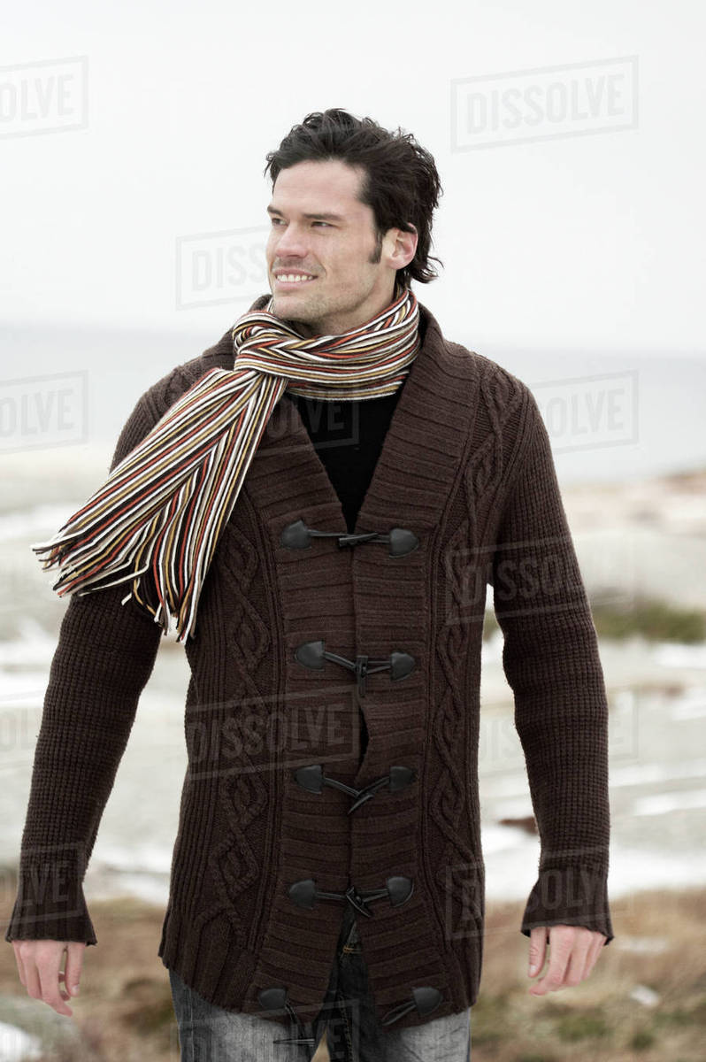 Smiling man looking away - Royalty-free Stock Photo | Dissolve