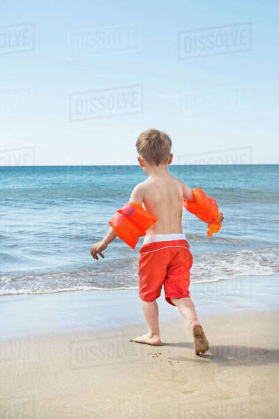Boy on beach - Stock Photo - Dissolve