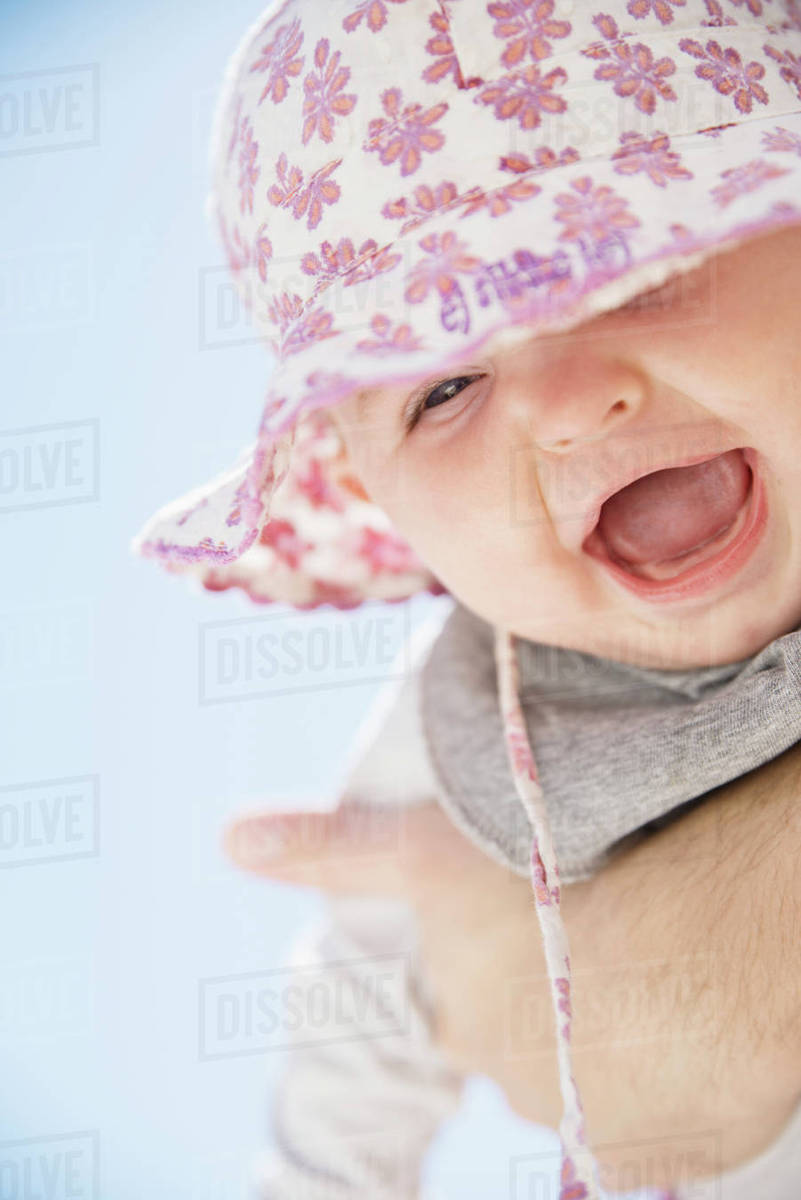 Laughing baby - Stock Photo - Dissolve