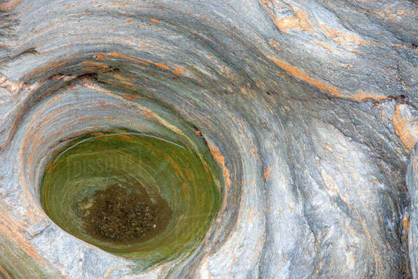 Water in rock hole - Stock Photo - Dissolve