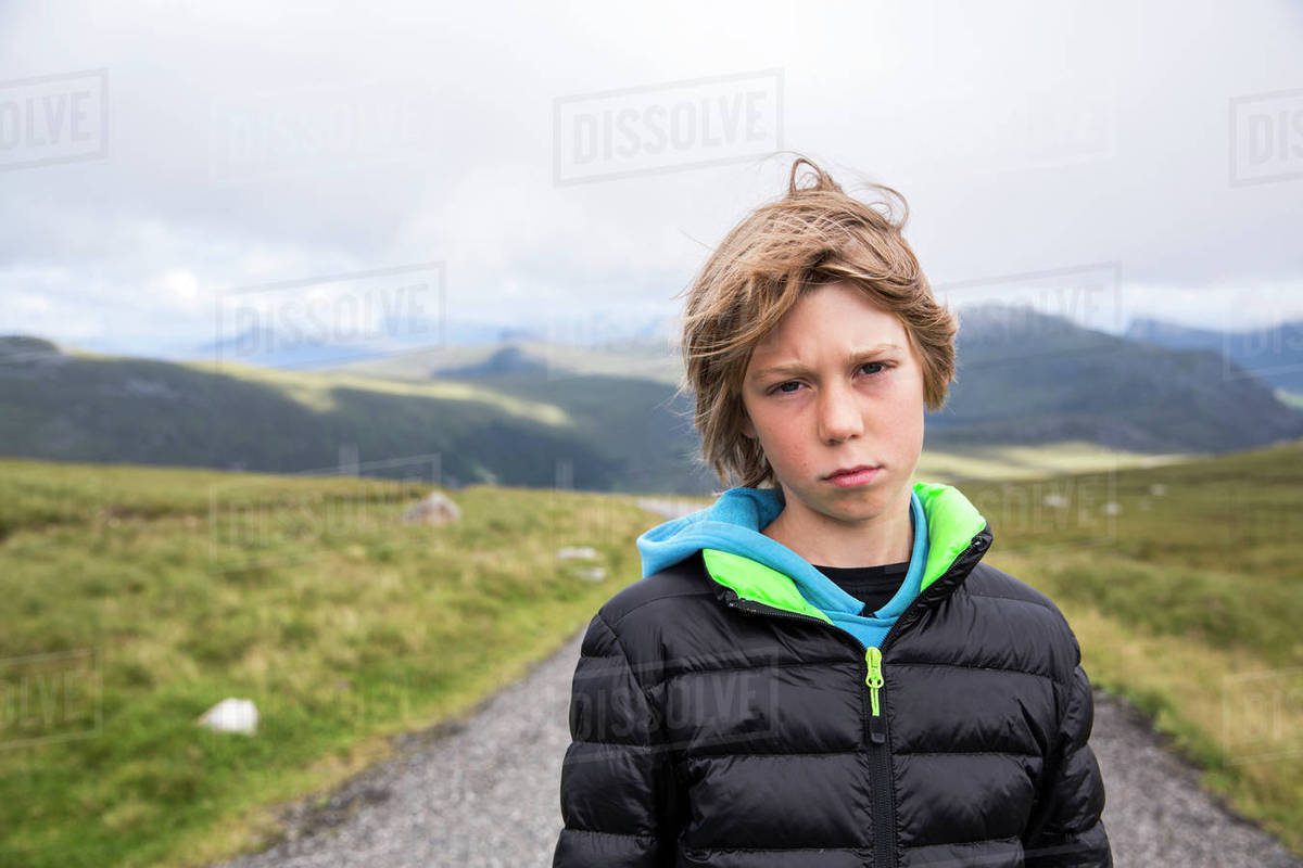 Portrait of serious boy - Royalty-free Stock Photo | Dissolve