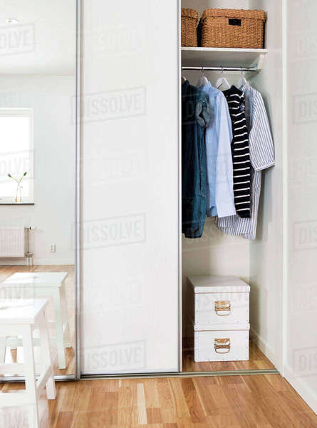 Open wardrobe - Stock Photo - Dissolve