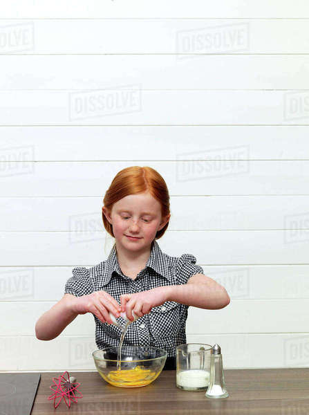 Girl cooking - Royalty-free Stock Photo | Dissolve