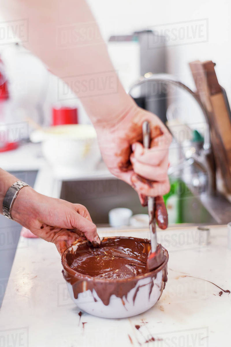Person mixing chocolate - Royalty-free Stock Photo | Dissolve