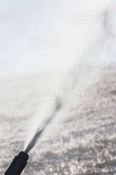 Water flowing through hose - Royalty-free Stock Photo | Dissolve