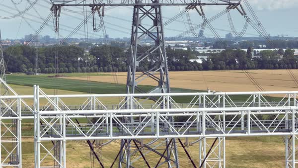 Pylons at a High Voltage Three Phase Electrical Substation - Stock ...