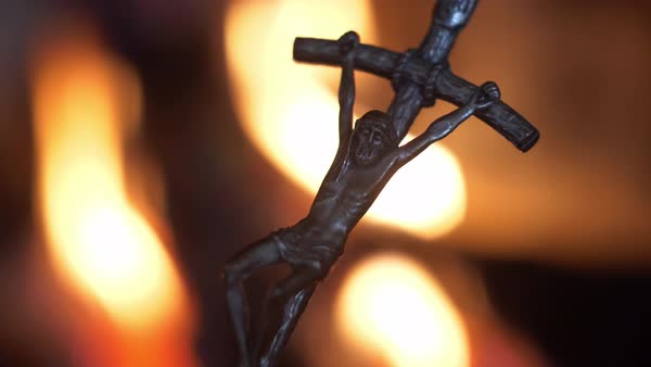 Crucifix Silhouette on Fire Flames Defocused Dark Background Slow ...