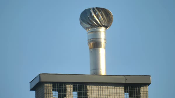 Wind-Rolling Cowl on Chimney Rotating on Wind - 4K Royalty-free Stock ...