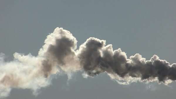 Smoke fumes from industrial chimney - Stock Video Footage - Dissolve