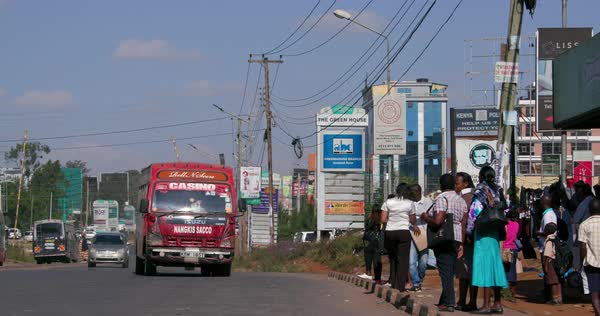 Passengers Wait For Matatus At Bus Stop, Ngong Road, Nairobi, Kenya ...