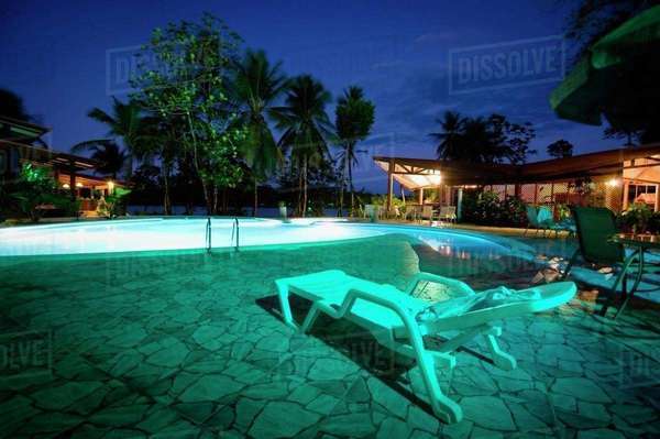 Pool-Side At A Tropical Rainforest Resort - Stock Photo - Dissolve