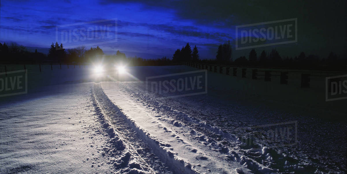 Car And Tire Tracks In Snow - Stock Photo - Dissolve