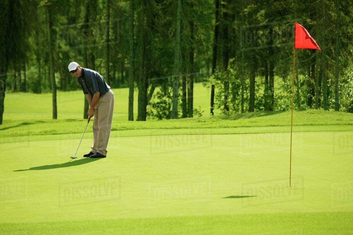 Aligning The Putt - Royalty-free Stock Photo | Dissolve Aligning The Putt - Royalty-free Stock Photo | Dissolve