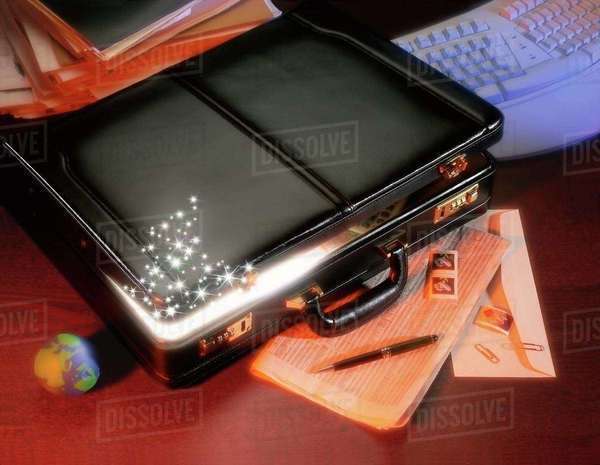 Briefcase Opening - Stock Photo - Dissolve