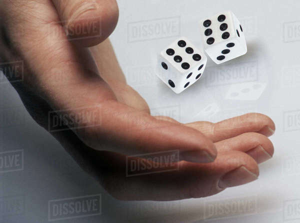 Hand Rolling Die - Royalty-free Stock Photo | Dissolve