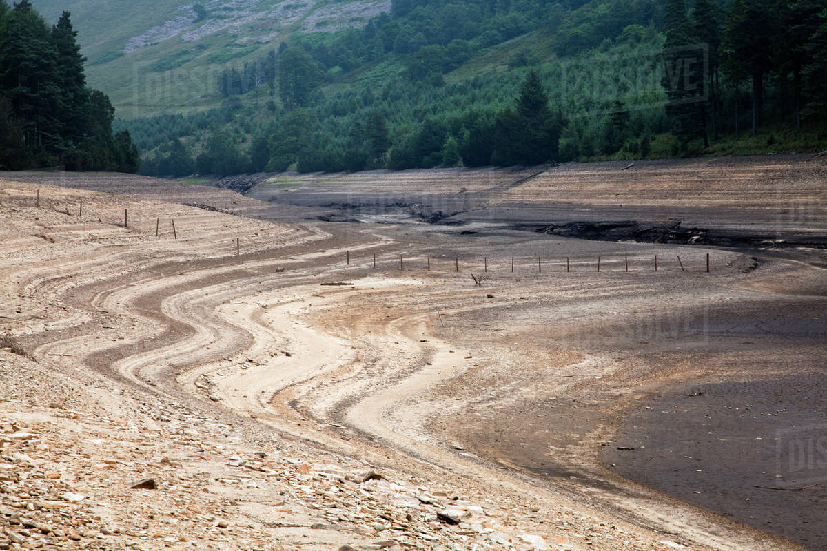 Dry reservoir during drought; Derbyshire, England - Stock Photo - Dissolve
