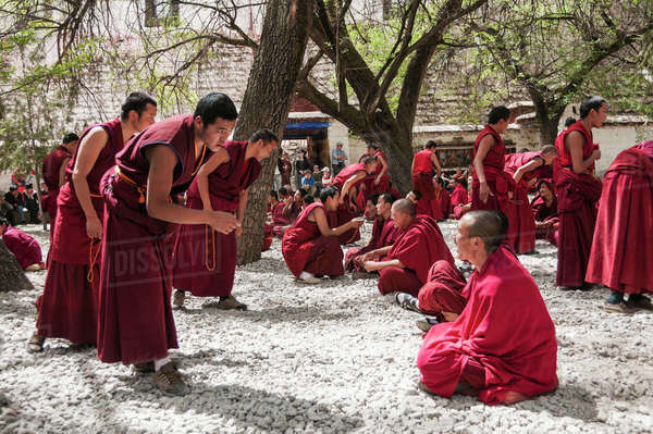 A Traditional Tibetan Debate In Sera Buddhist Monastery, Near Lhasa ...