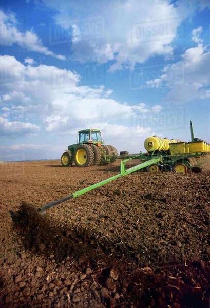 Agriculture - Corn, tractor planting corn seed / Janesville, Wisconsin ...