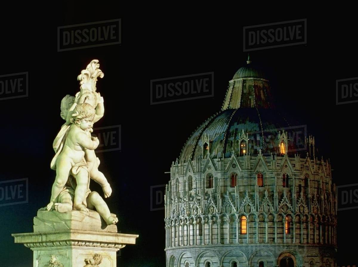 Statue Near Cathedral At Night - Stock Photo - Dissolve