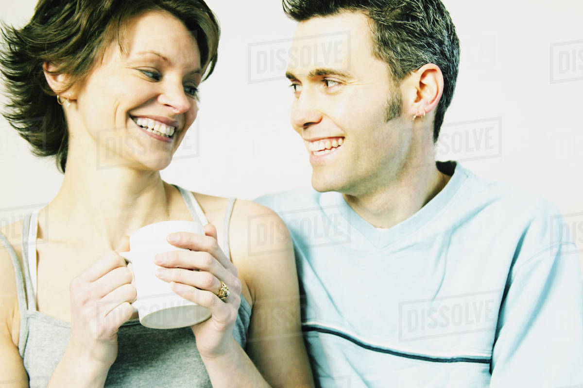 Couple Enjoy Morning Company - Stock Photo - Dissolve