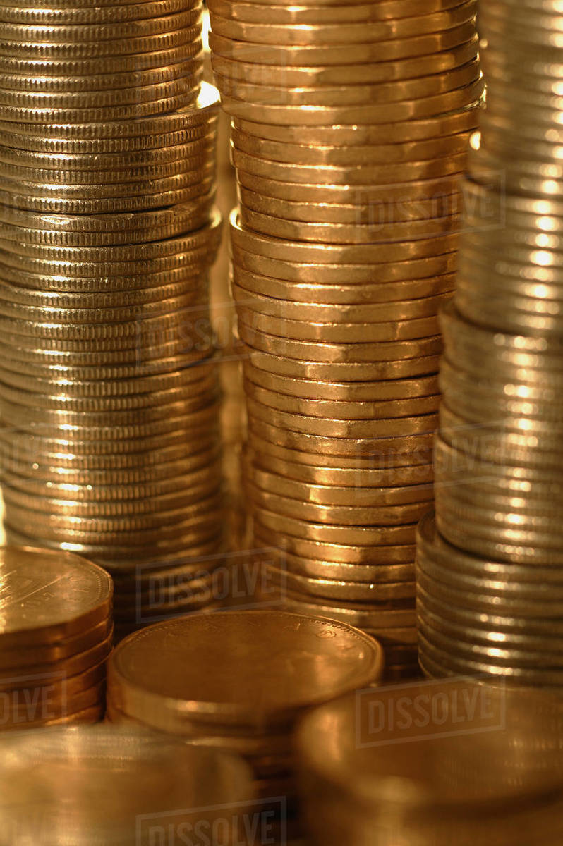 Stacks Of Loonies - Stock Photo - Dissolve