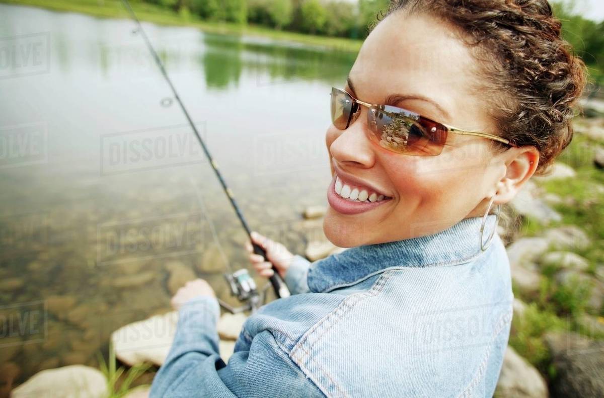 Woman Fishing - Royalty-free Stock Photo | Dissolve