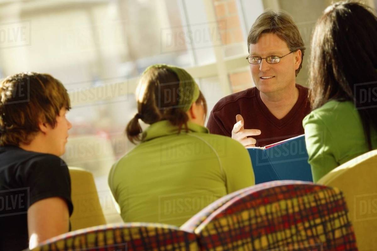 Teacher Teaching Students - Stock Photo - Dissolve