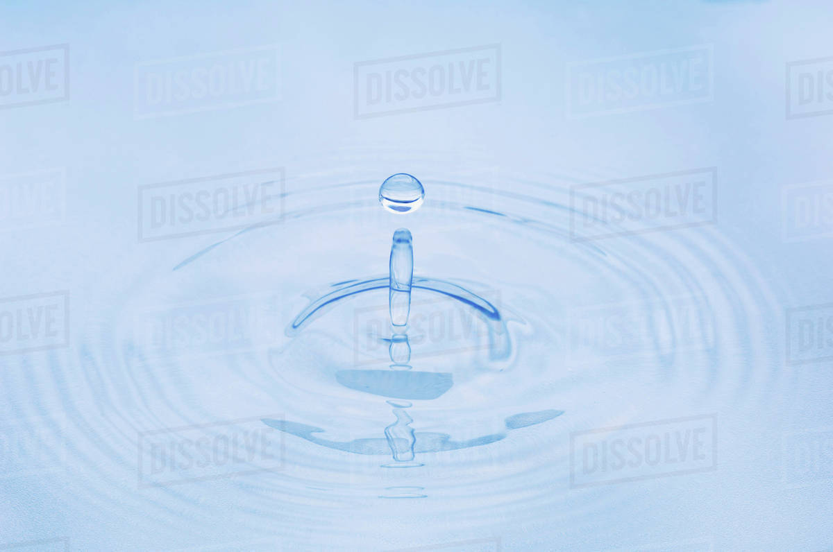Close Up Of Water Droplet Hitting The Surface Of Water Alaska - Stock ...