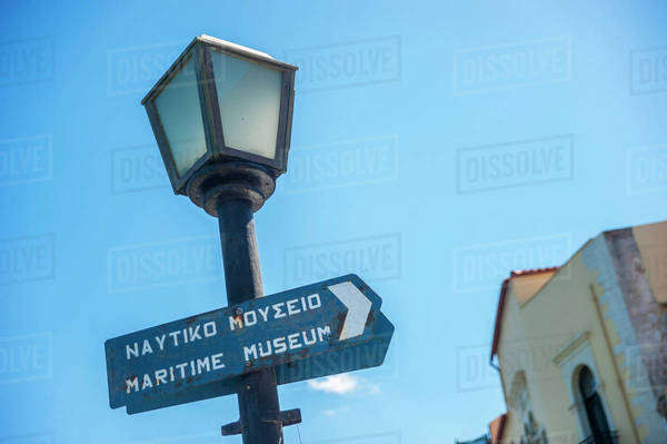 Sign for the Maritime Museum on a lamp post; Chania, Crete, Greece ...