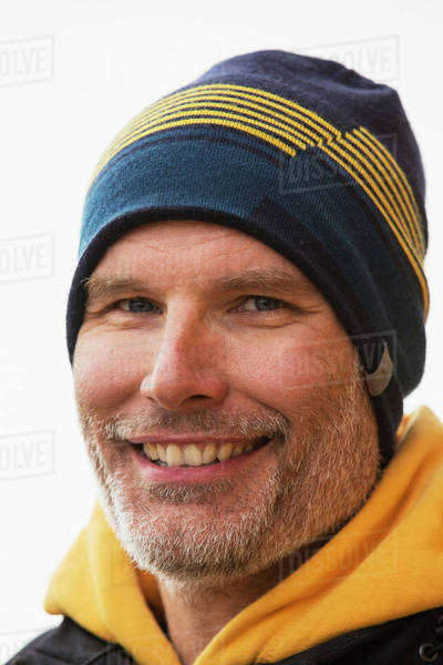 Portrait of a man with a cap and beard; Canada - Stock Photo - Dissolve
