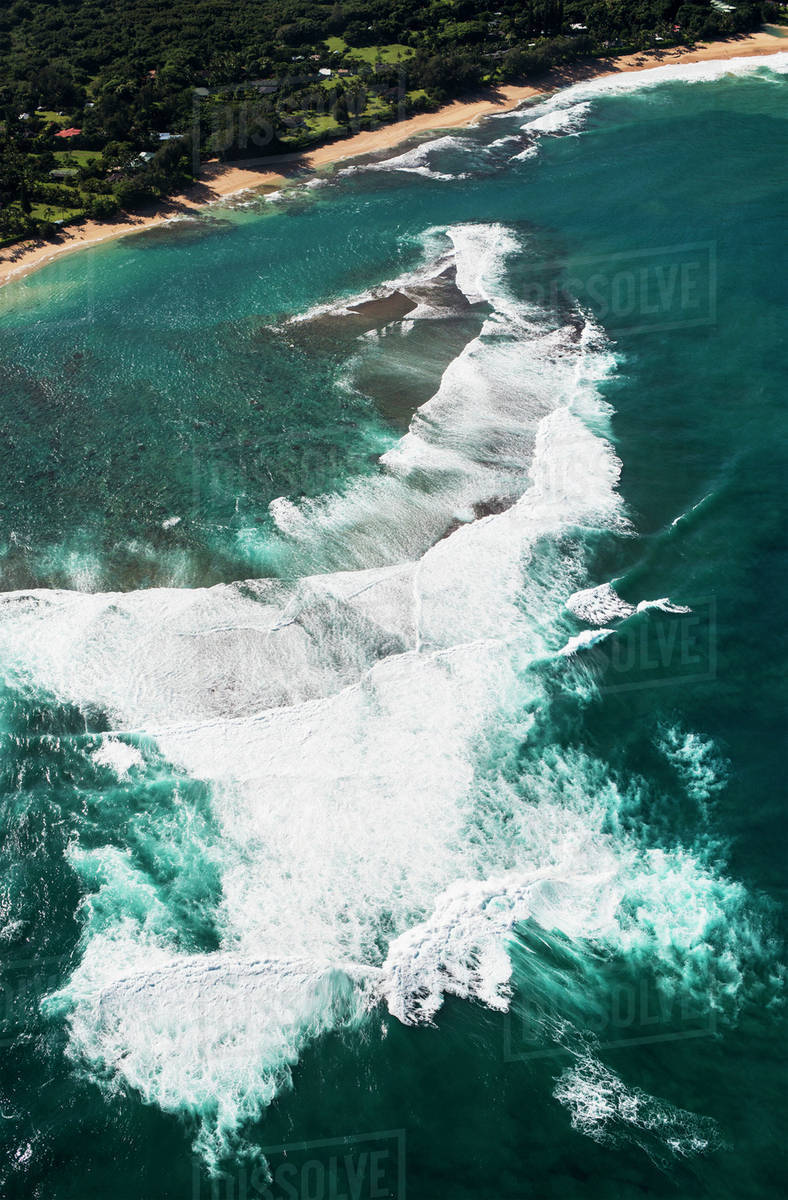 Surf meets the beach at Haena; Haena, Hawaii, United States of America ...