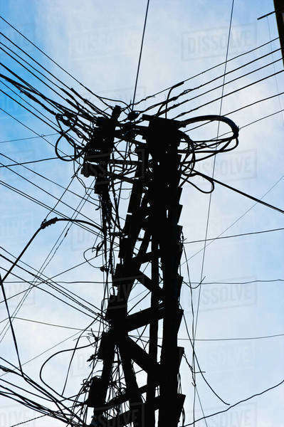 Electrical wires jumbled from a transmitter on a tower; Beirut, Lebanon ...