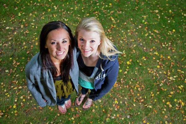 High angle view of a portrait of two teenage girls; Edmonton, Alberta ...