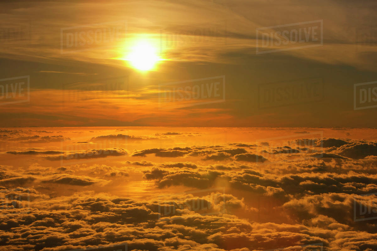 Sunset Above The Clouds