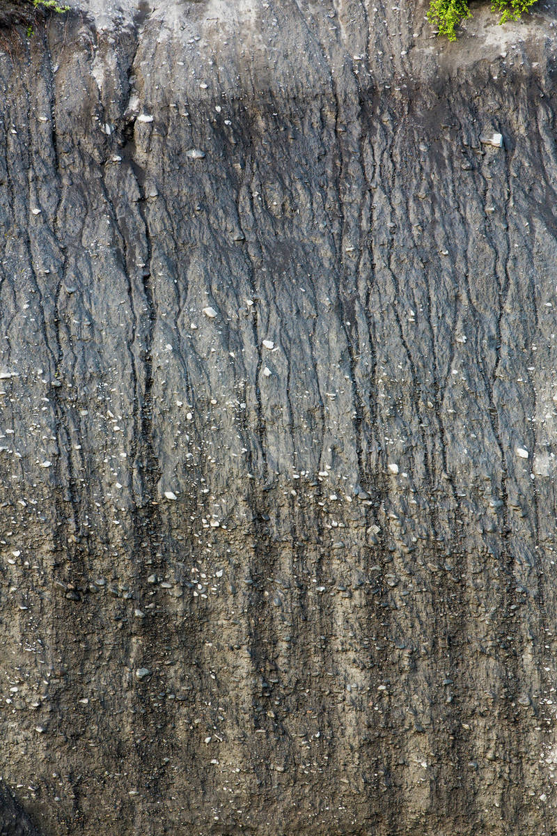 Close up of a rock surface showing layers of sediment; Valdez, Alaska ...